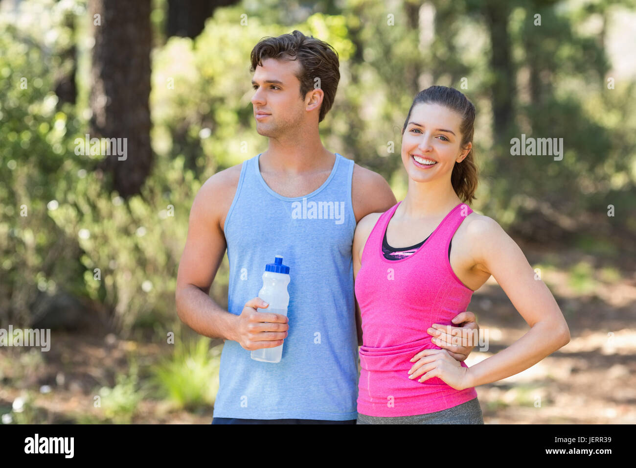 Portrait of happy woman with partner Stock Photo - Alamy