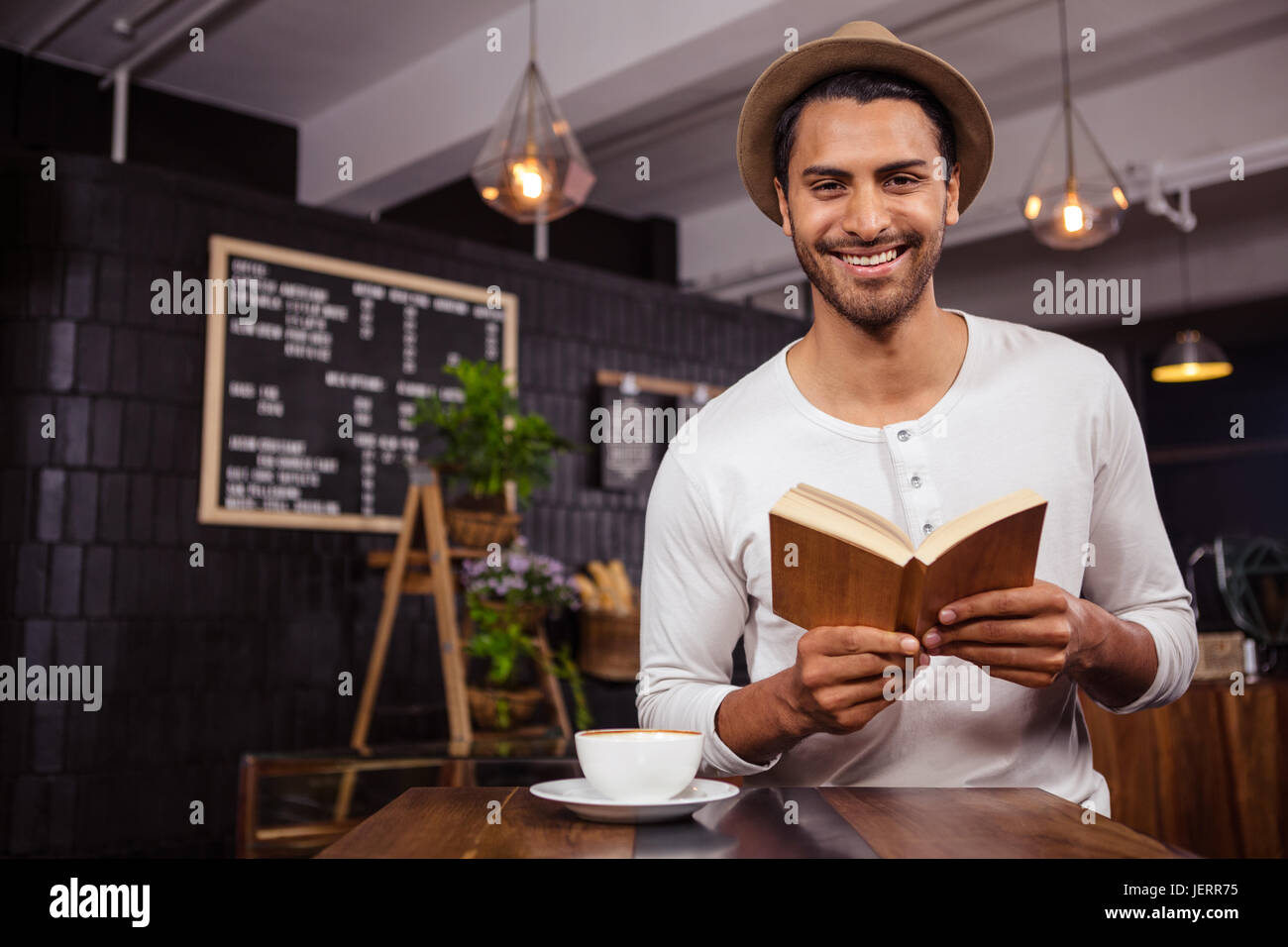 Man reading a book Stock Photo - Alamy