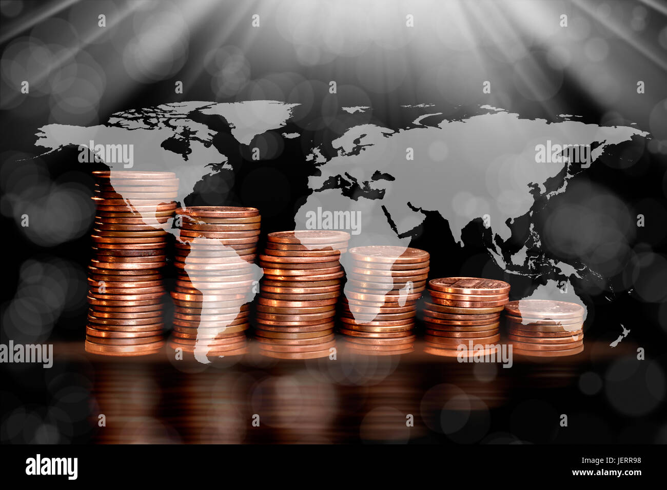 conceptual image of coins and world map Stock Photo - Alamy