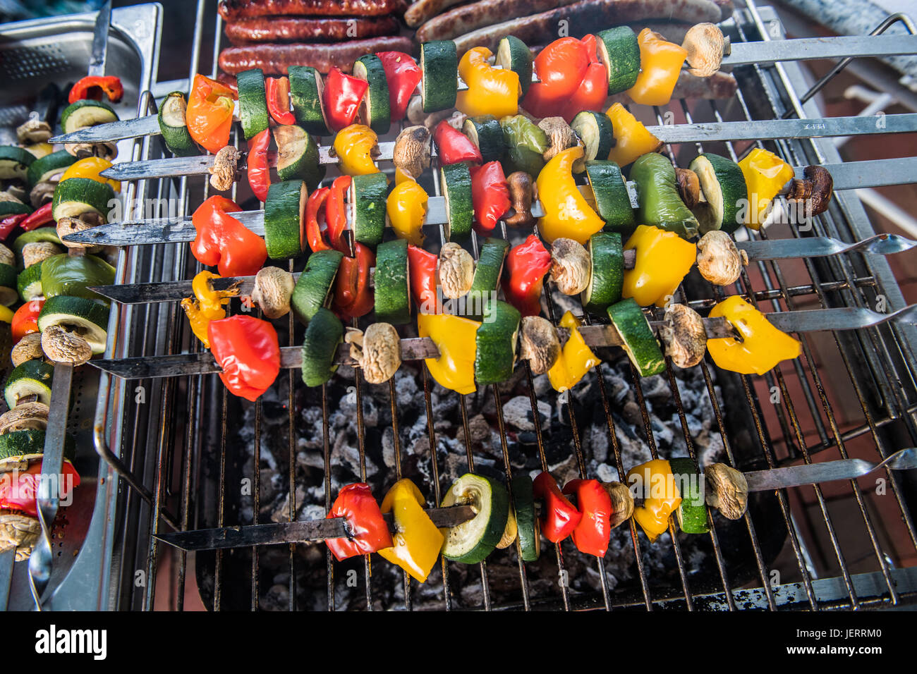 Preparing a barbecue for a dinner party Stock Photo - Alamy