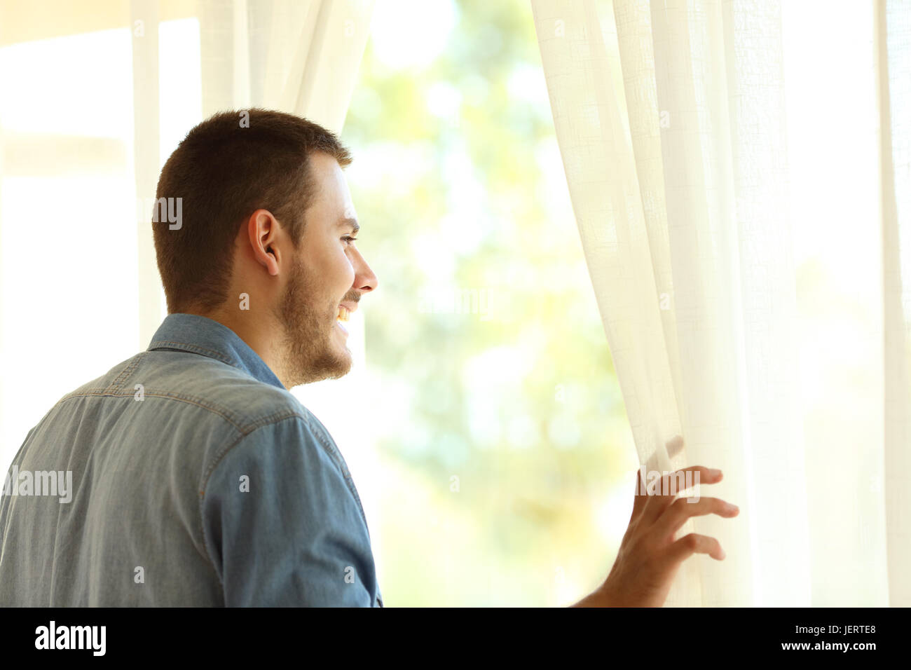 Open curtain hi-res stock photography and images - Alamy