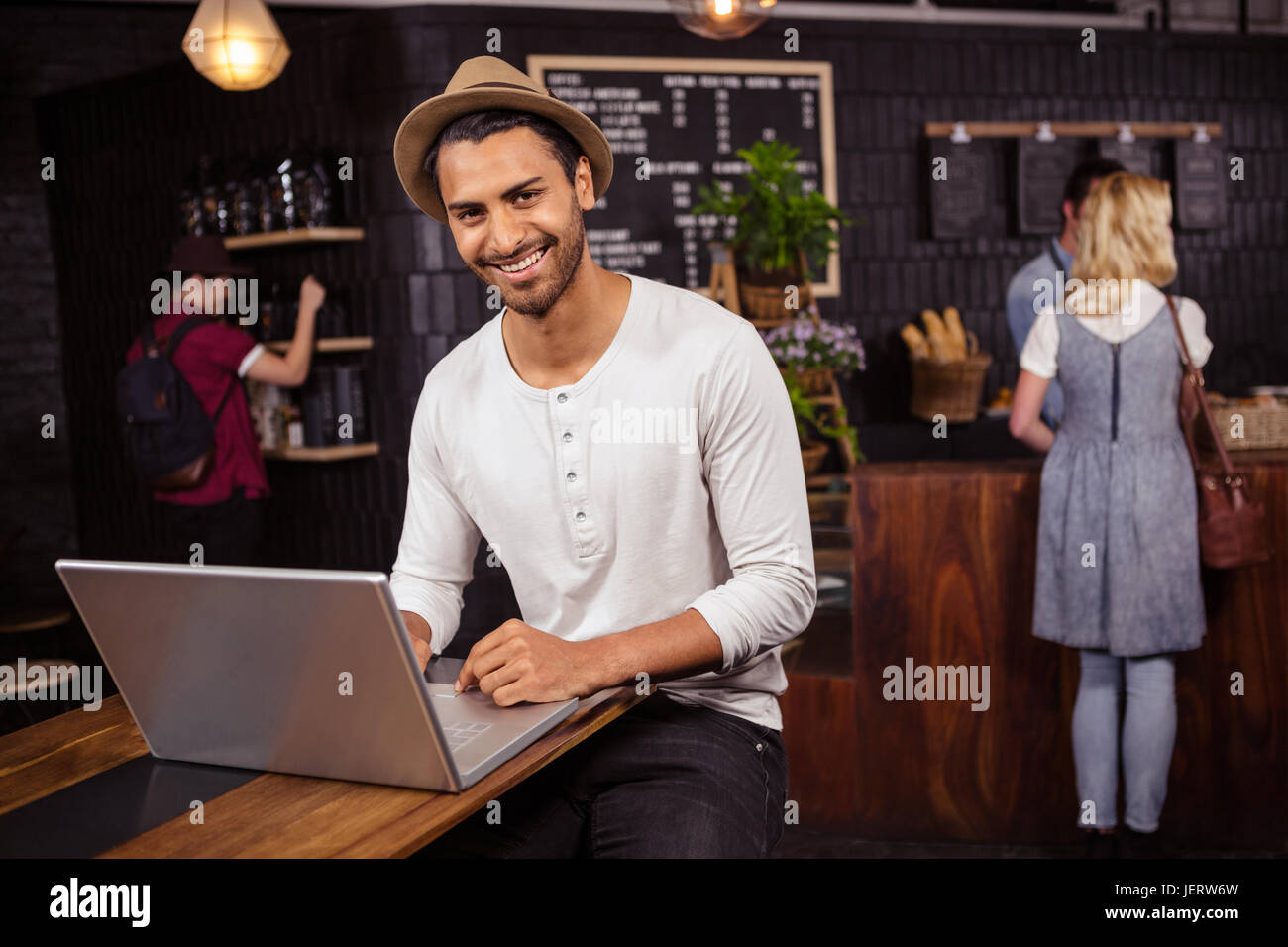 Man using a laptop Stock Photo - Alamy