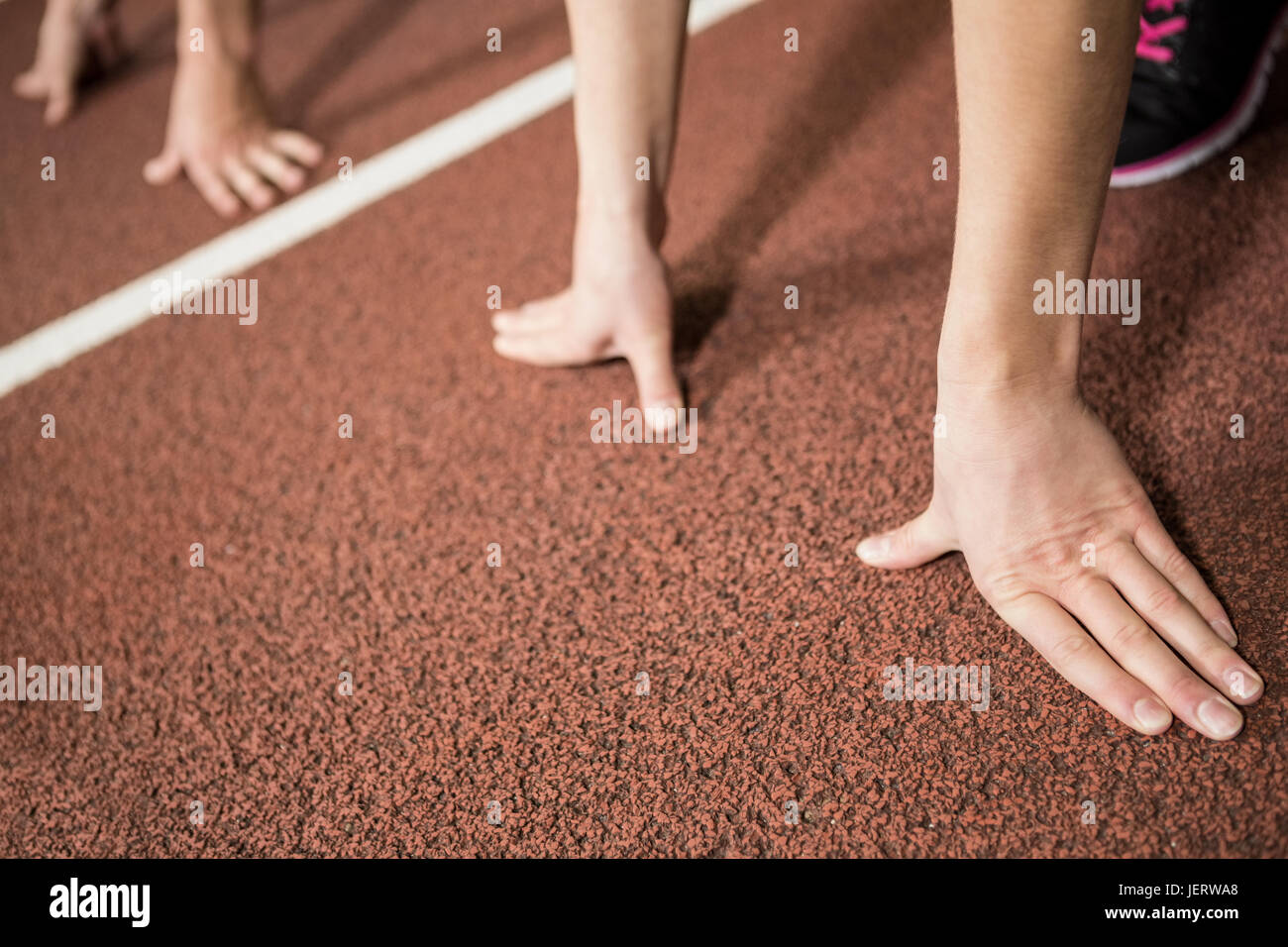 Run in ready position Stock Photo - Alamy