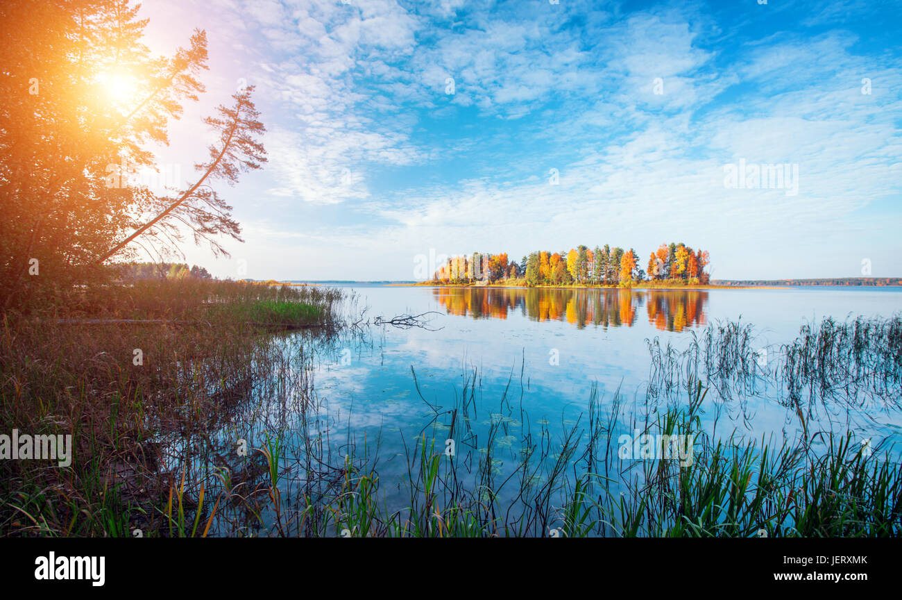 Autumn island and lake Stock Photo - Alamy