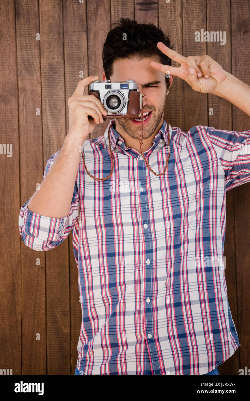 Man photographing with camera Stock Photo - Alamy