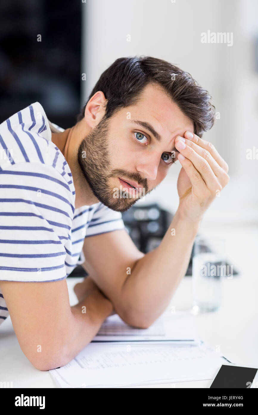 Man looking at bills hi-res stock photography and images - Alamy