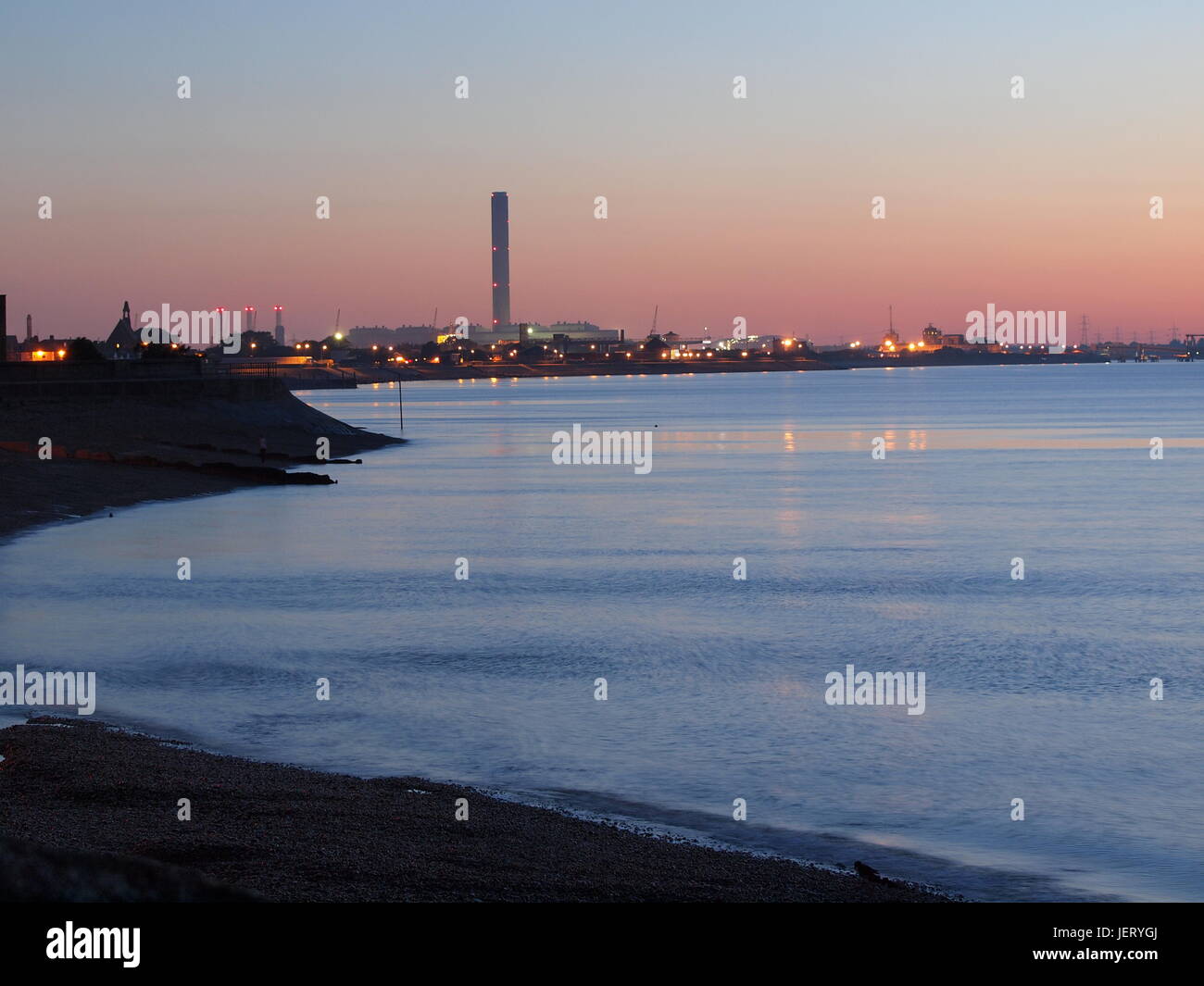 Sheerness beach just after sunset Stock Photo - Alamy