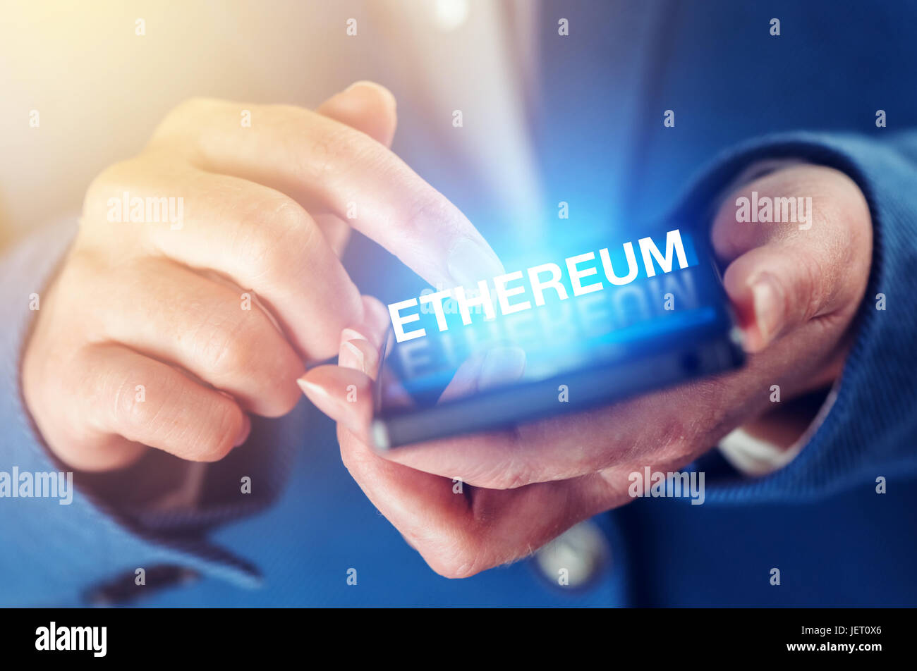Ethereum cryptocurrency concept with female hands and smartphone Stock ...
