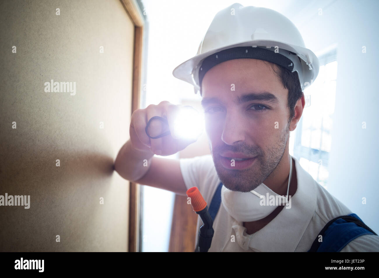 Worker holding flashlight hi-res stock photography and images - Alamy