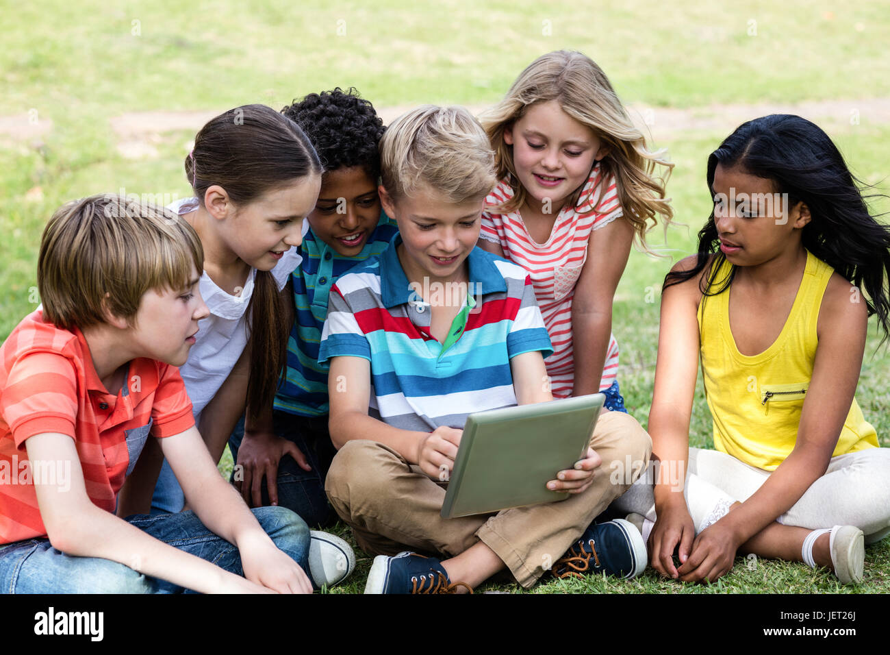 Children using digital tablet Stock Photo - Alamy