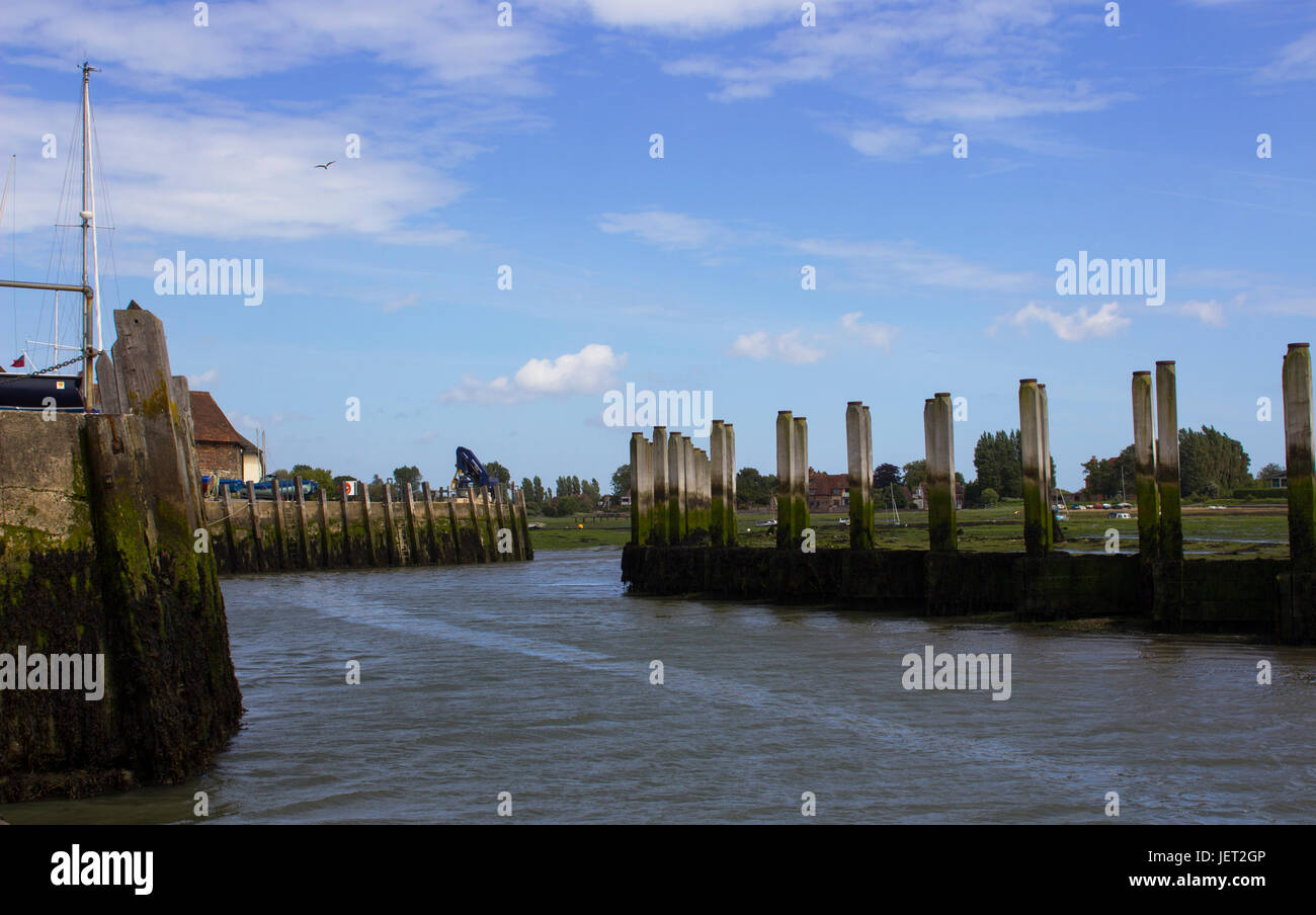The dredged deep water channel and quayside at Bosham Harbour in West ...