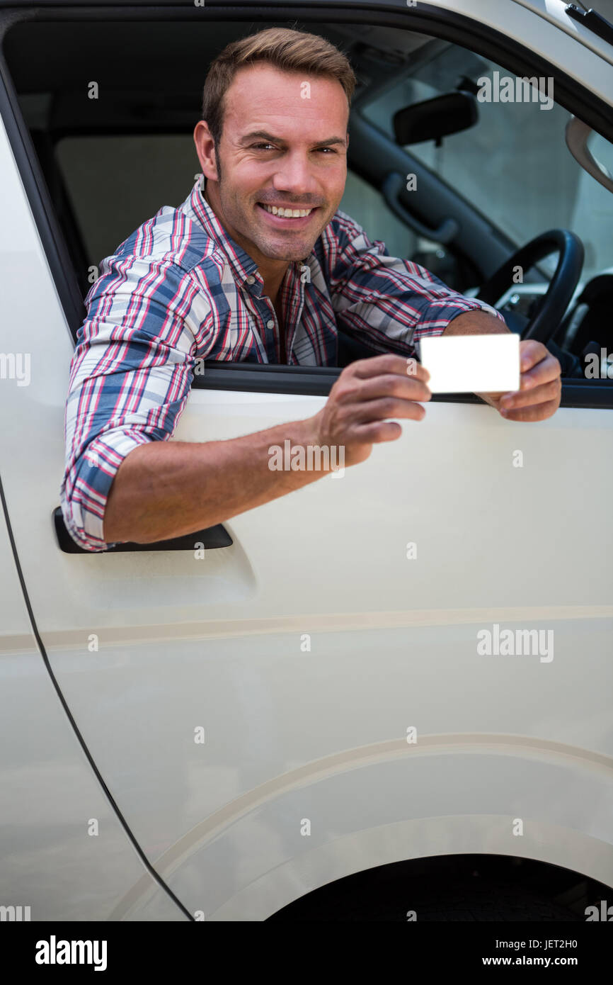 Young man showing his drivers license Stock Photo - Alamy