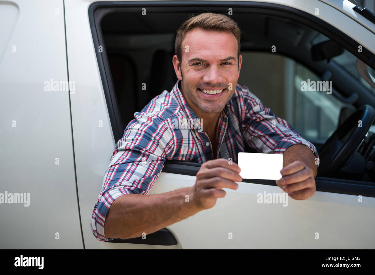 Young man showing his drivers license Stock Photo - Alamy