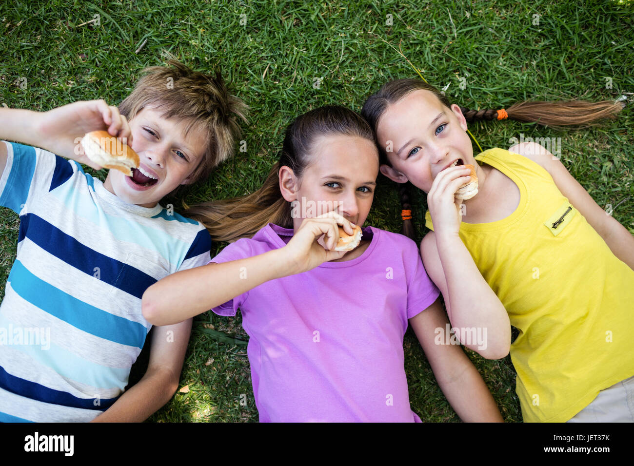 Boy with bun hi-res stock photography and images - Alamy