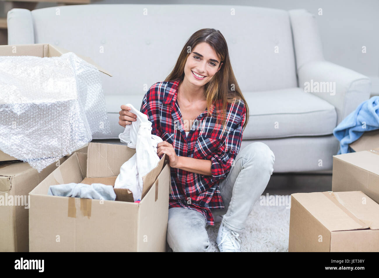 Beautiful Woman Unpacking Carton Boxes Stock Photo Alamy