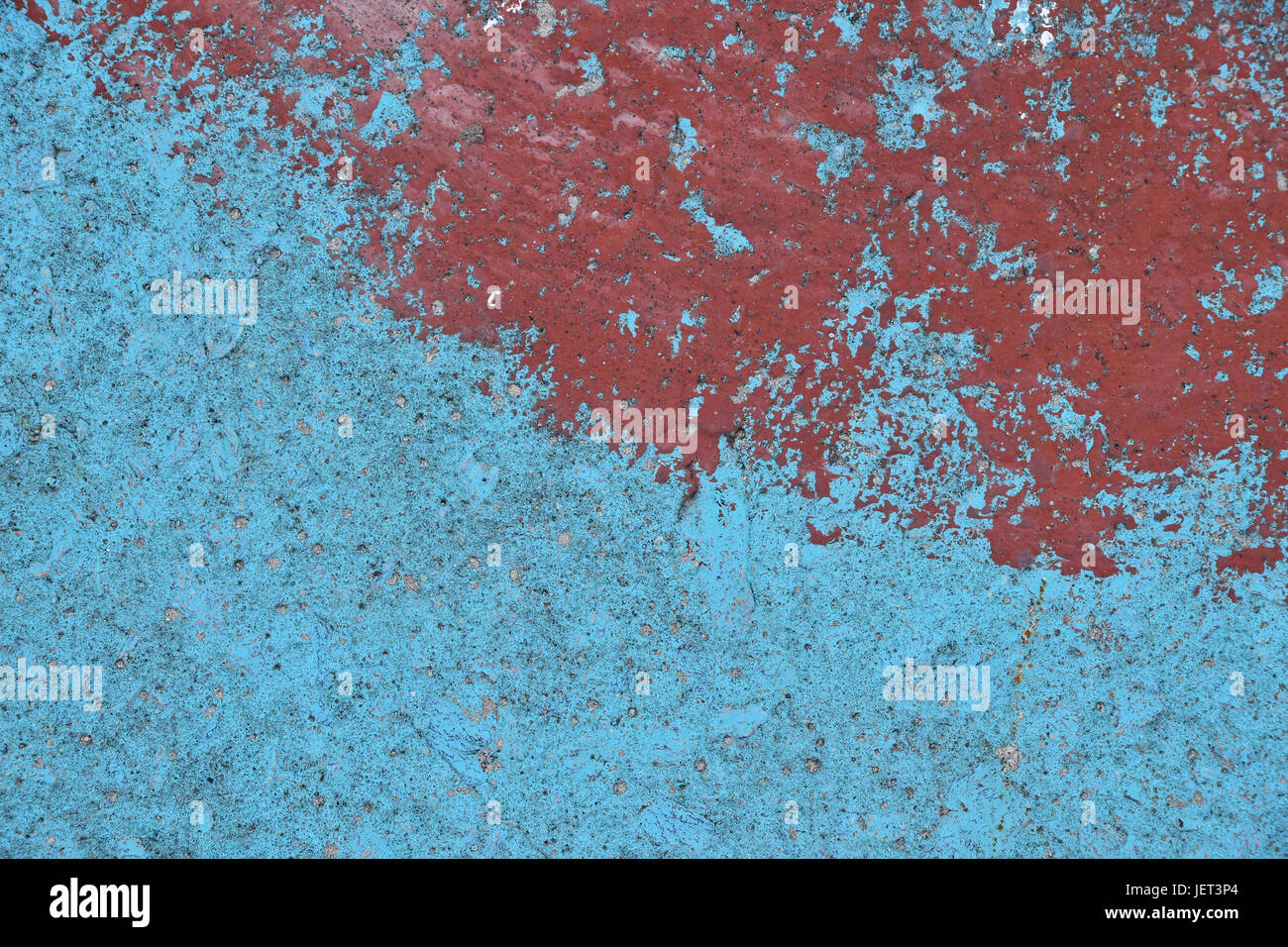 Blue and red painted rough concrete wall or floor texture background ...