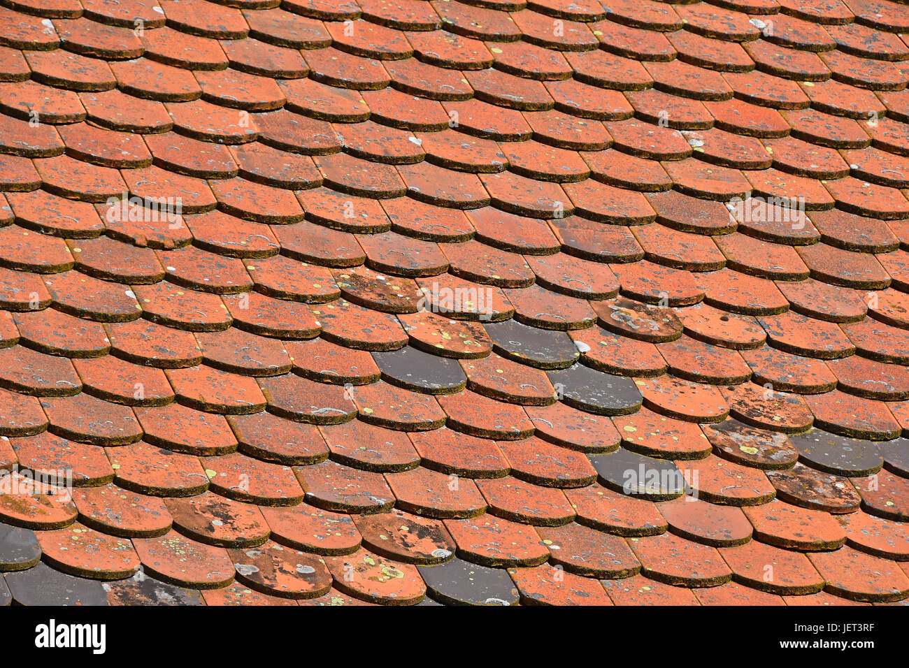 Old weathered vintage traditional red brown ceramic roof tiles pattern ...