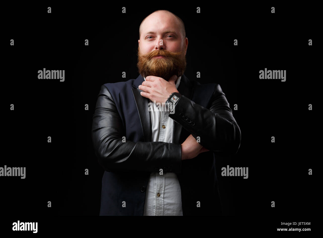 Stroking his beard hi-res stock photography and images - Alamy