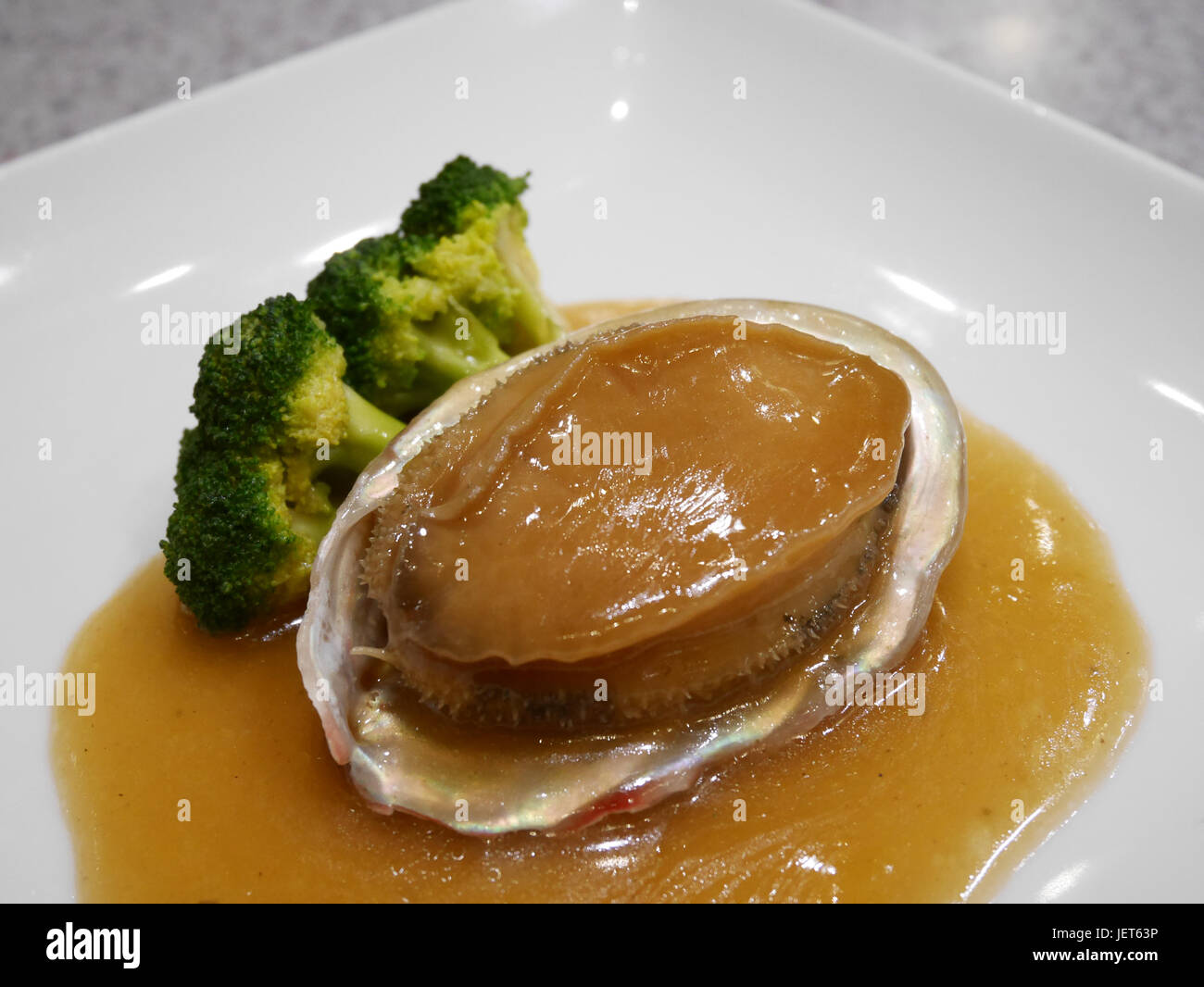 Chinese abalone dish Stock Photo - Alamy