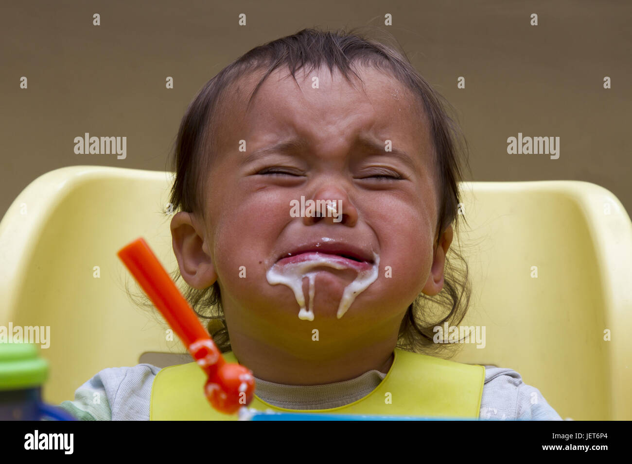 Angry sad disobedient baby child will not eat, feeding problems Stock ...