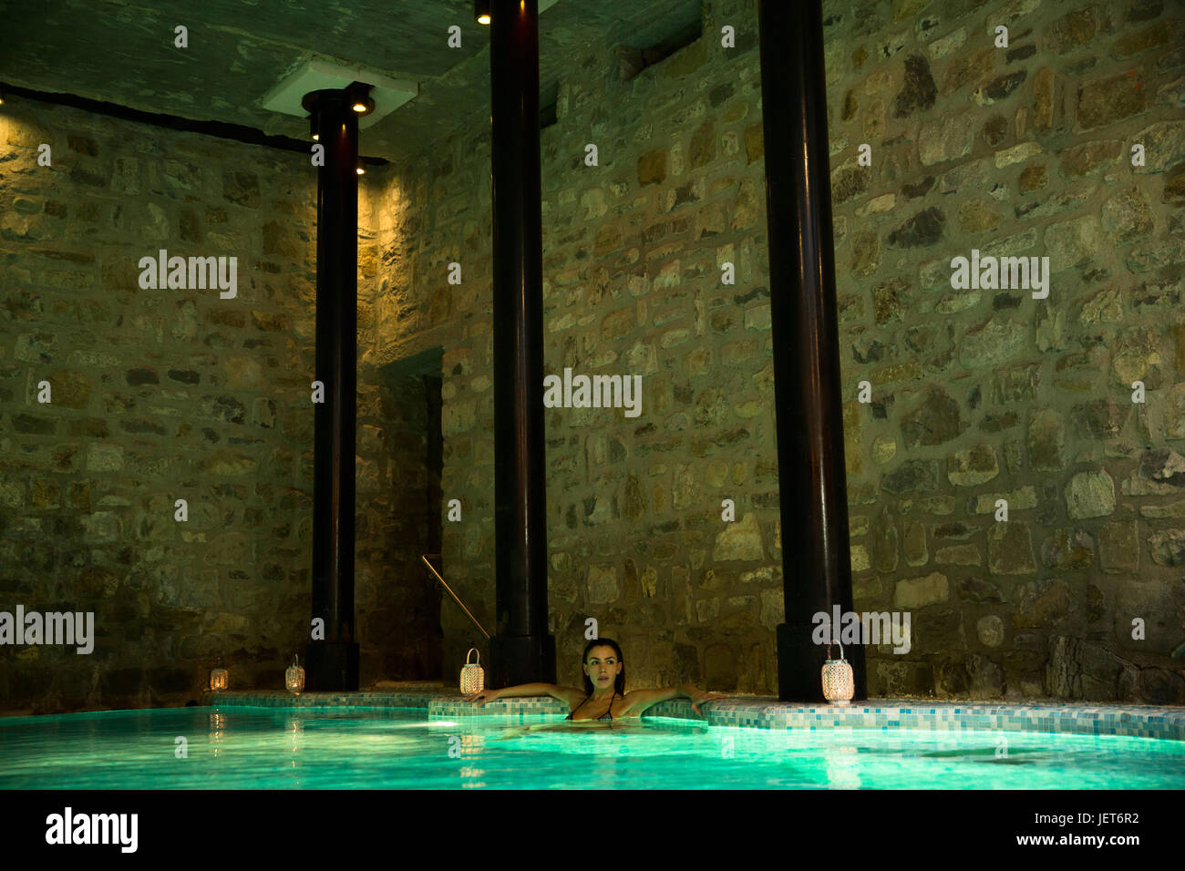 Woman inside the spa pool with lanterns hi-res stock photography and ...