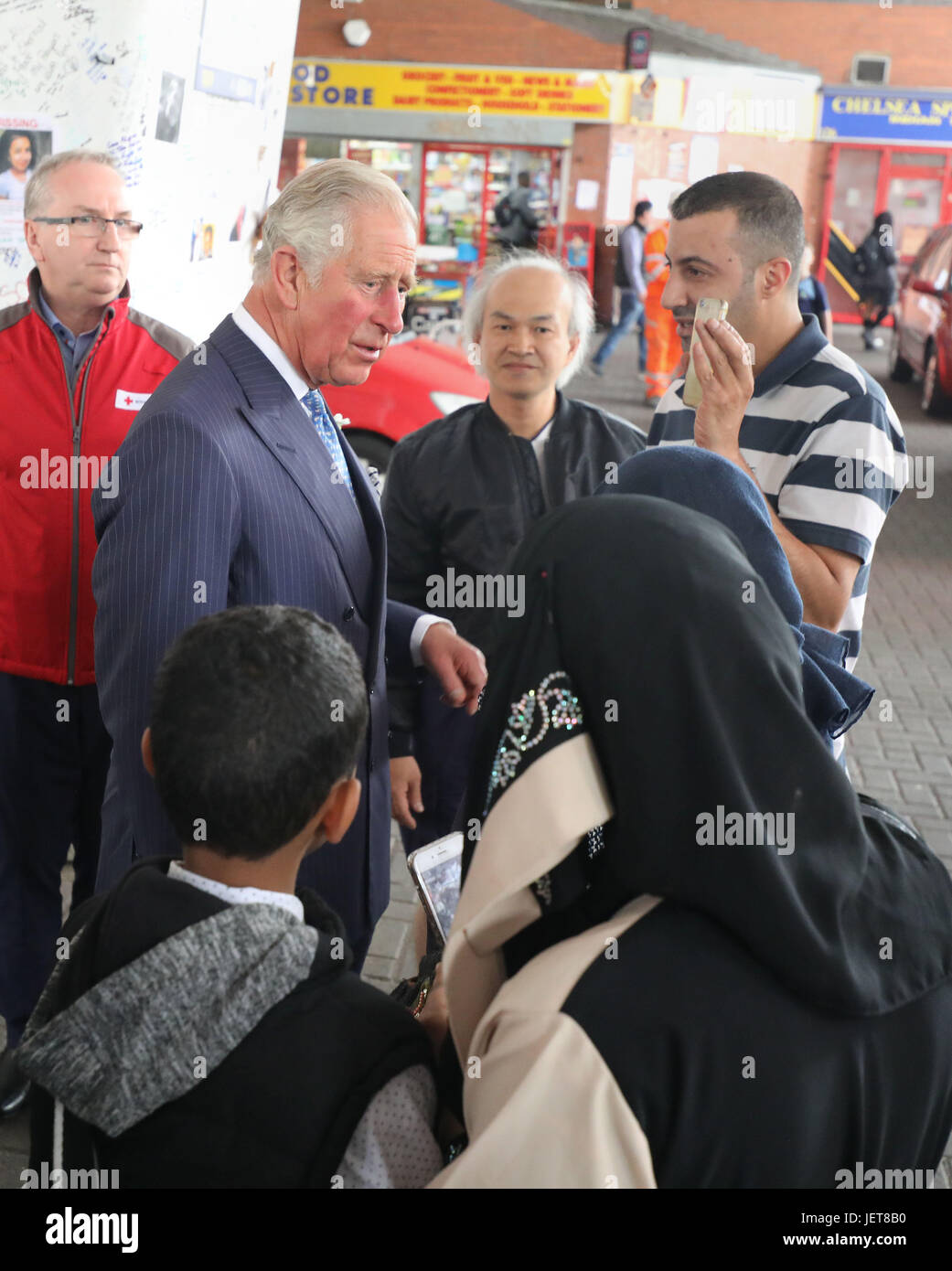 The Prince of Wales meets local residents during a visit to the Westway ...
