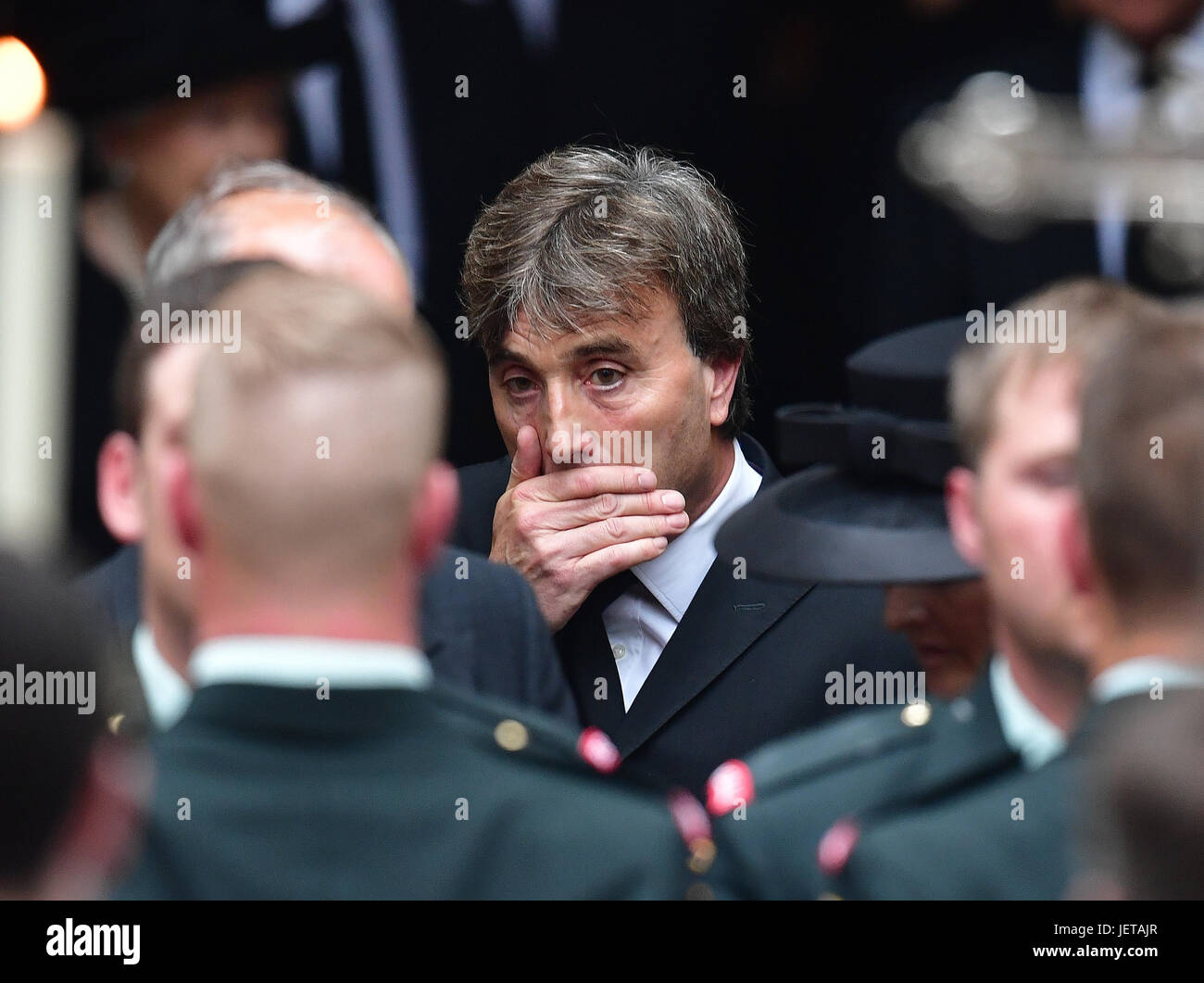 Mourner at funeral hi-res stock photography and images - Alamy