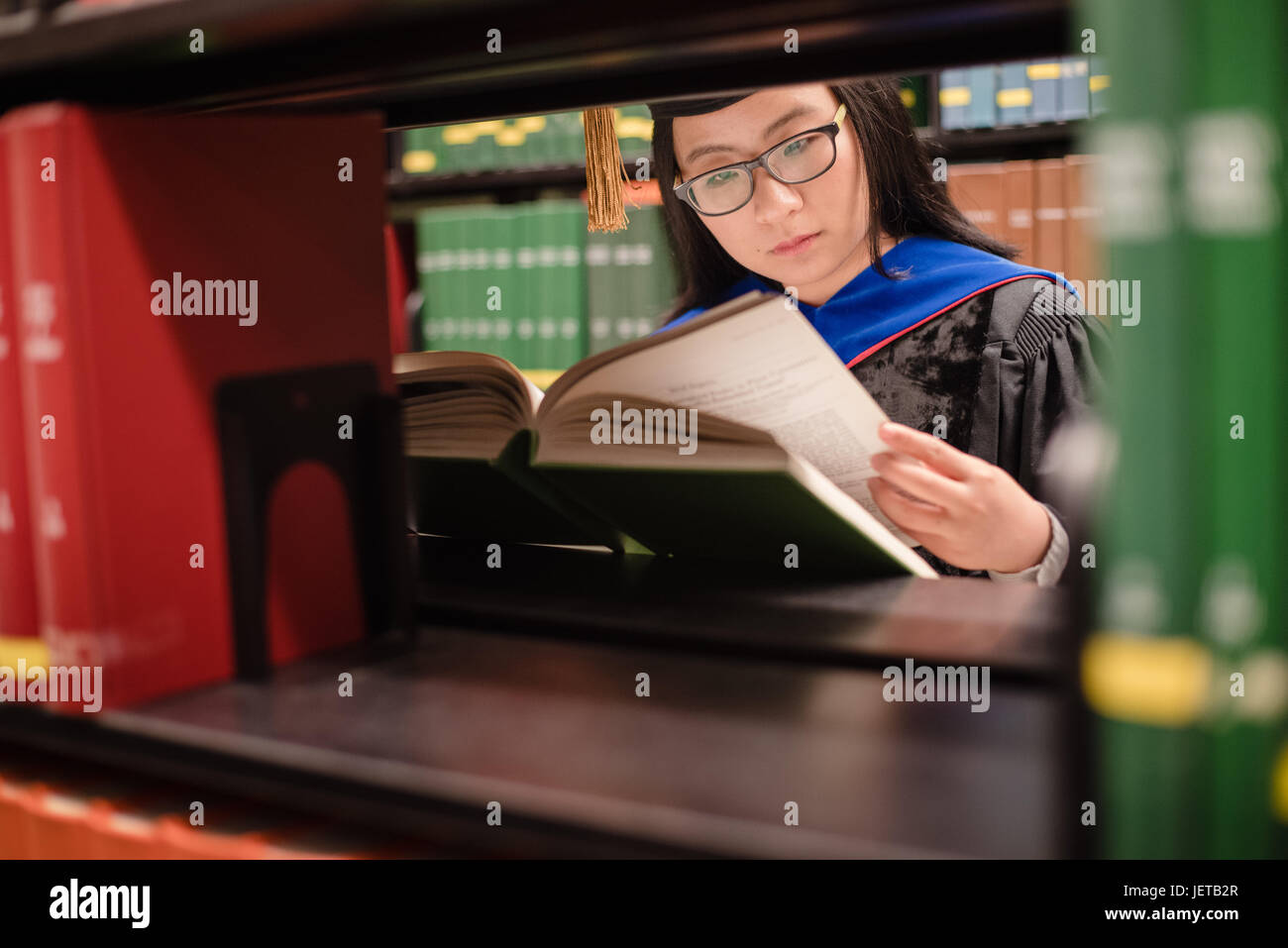 Doctor reading book hi-res stock photography and images - Alamy