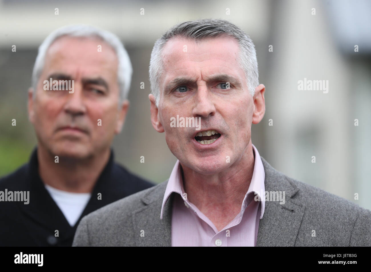 Sinn Fein's Pat Sheehan (left) and Declan Kearney speak to the media ...