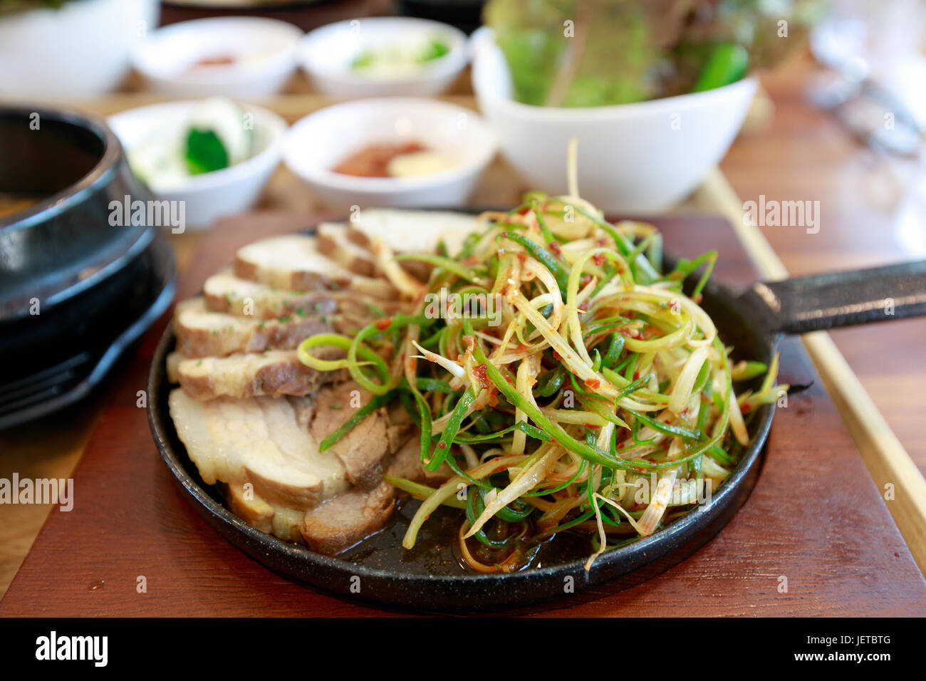 Boiled pork with salad, Bossam Stock Photo - Alamy