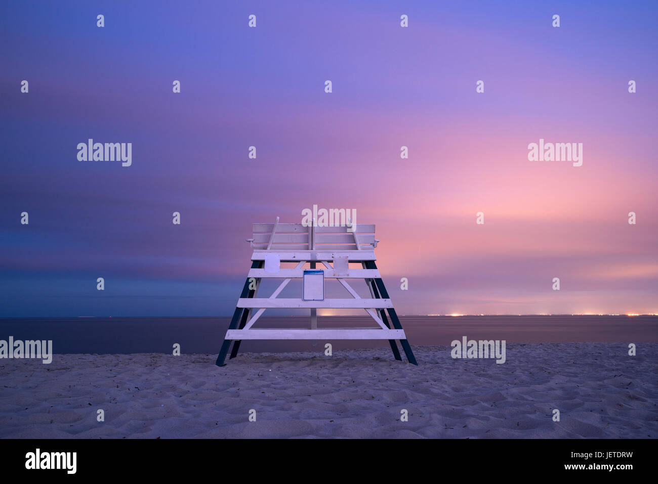 Bench on the beach Stock Photo - Alamy