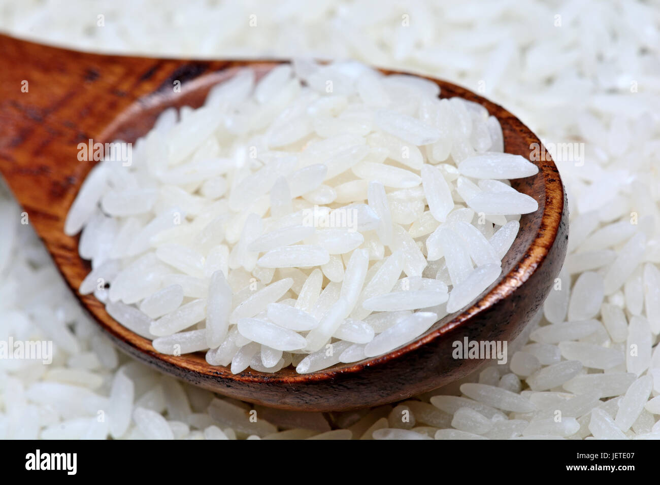 Uncooked white rice in hi-res stock photography and images - Alamy