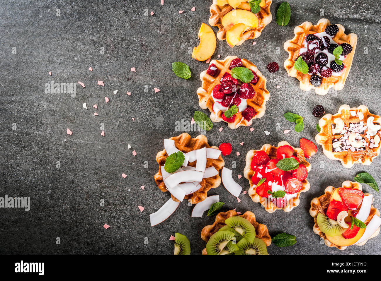 Set of fresh Belgian soft wafers with different toppings - peach ...