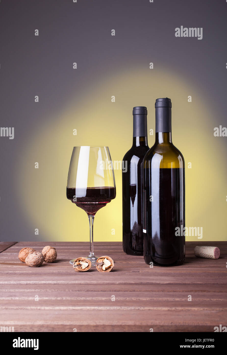Italian red wine in bottles and wineglass Stock Photo - Alamy