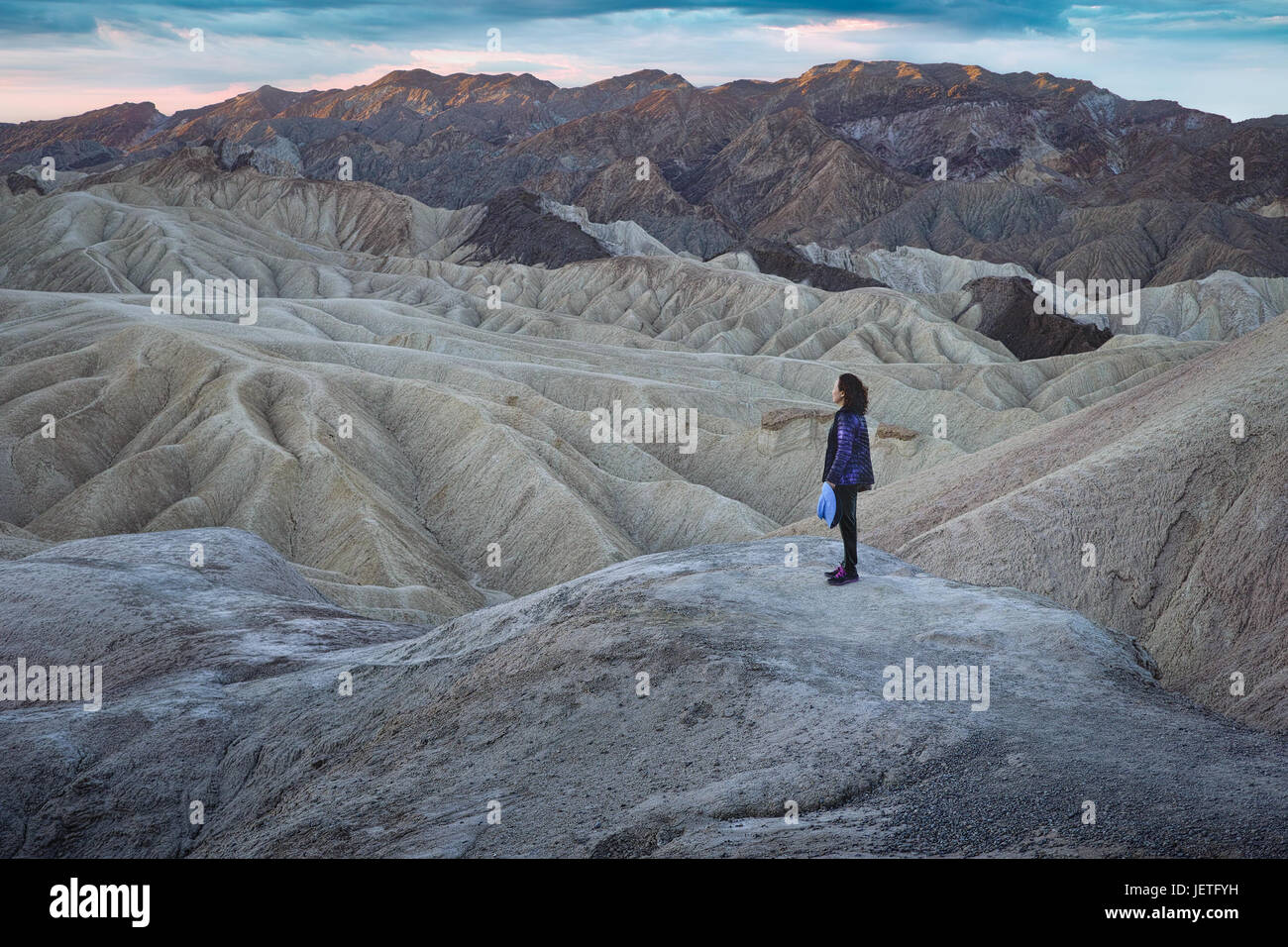 Traveler look into the deep valleys in the Death Valley, USA Stock ...