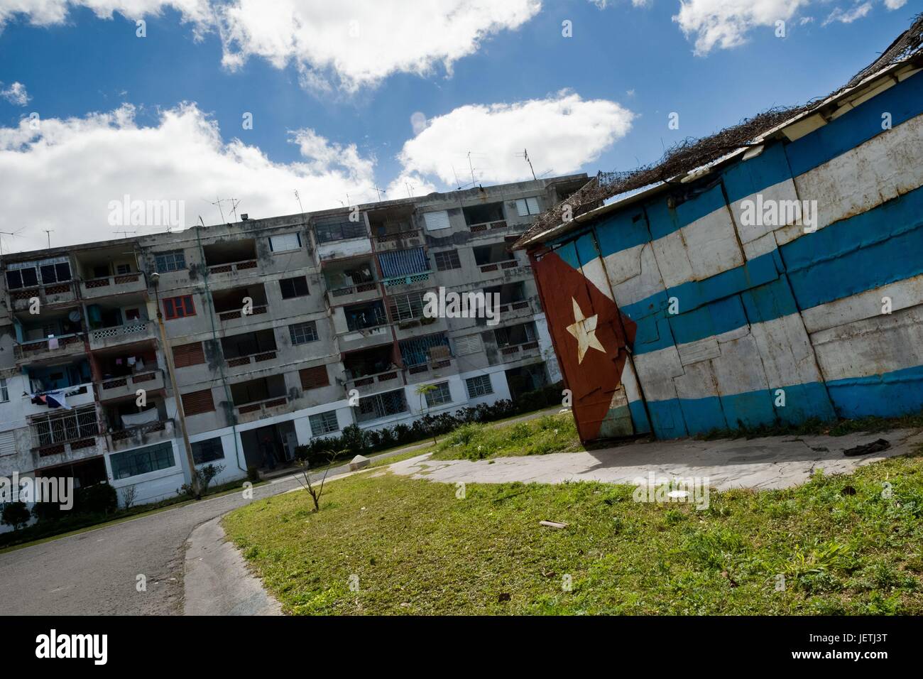 A Cuban national flag is seen painted on a shack in Alamar, a huge ...