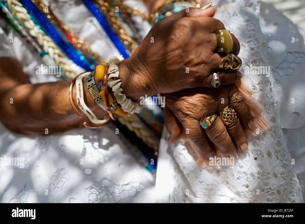 Hands of a priestess of Cadomble(Mv£e-de-santo, iyalorishv°) seen ...