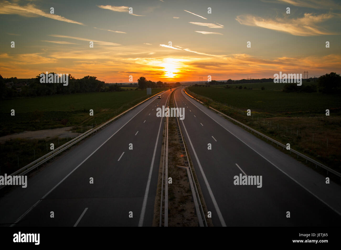 HIGHWAY SUNSET ,CENTERED Stock Photo - Alamy