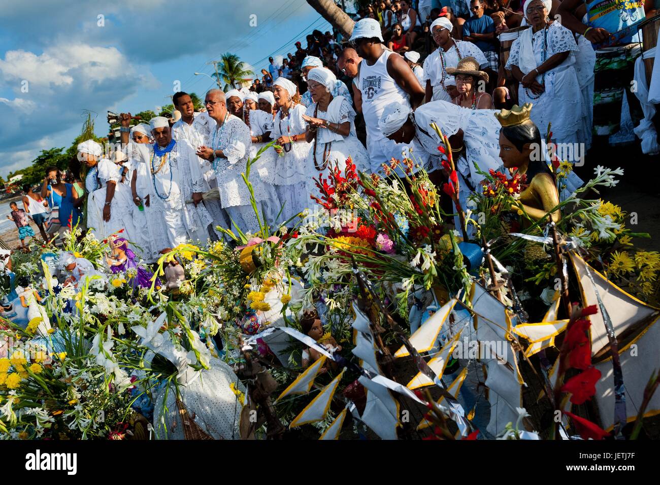 Candomble devotees dance and sing during the ritual procession in honor ...