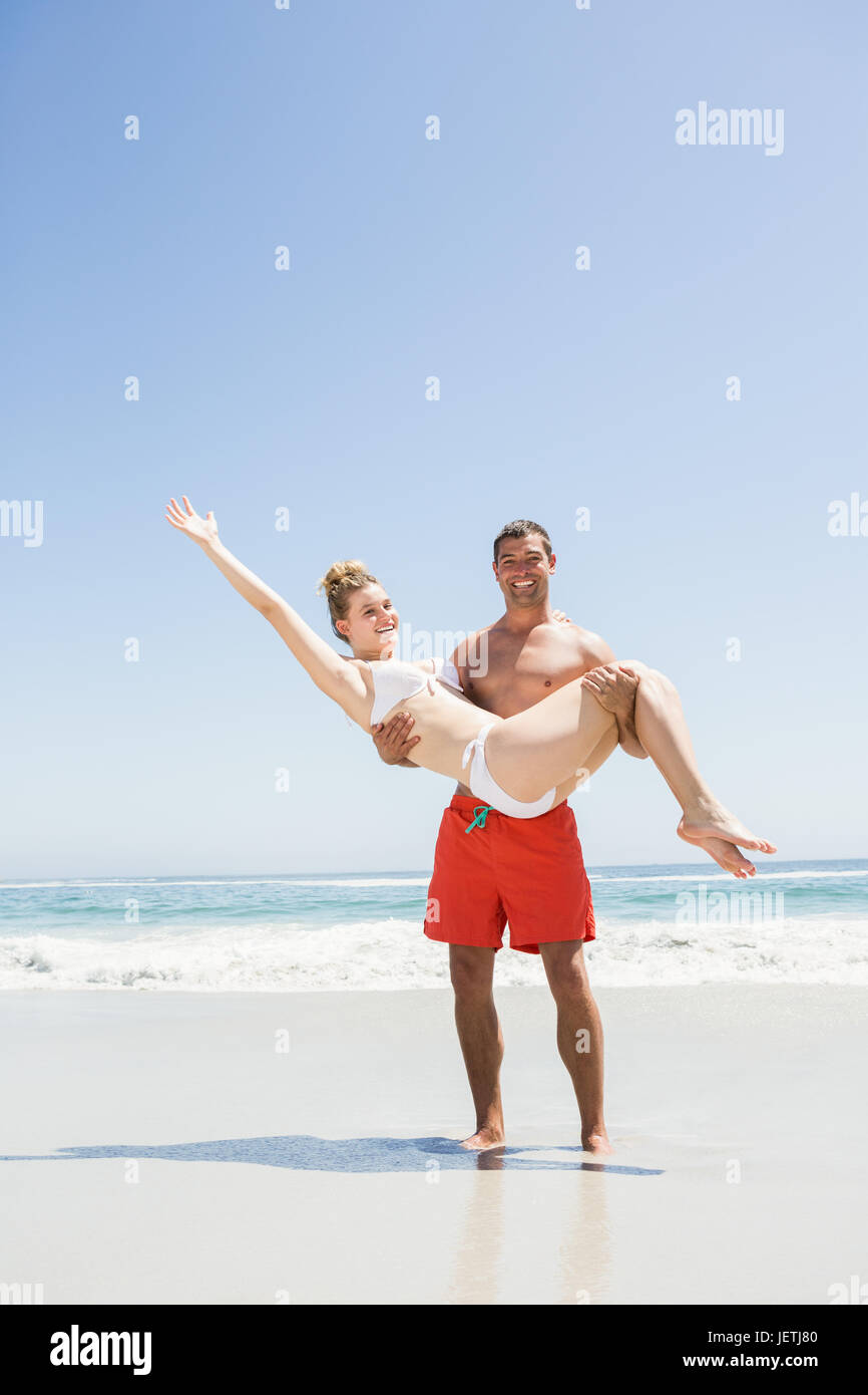 Boyfriend carrying his girlfriend Stock Photo - Alamy Boyfriend carrying his girlfriend Stock Photo - Alamy