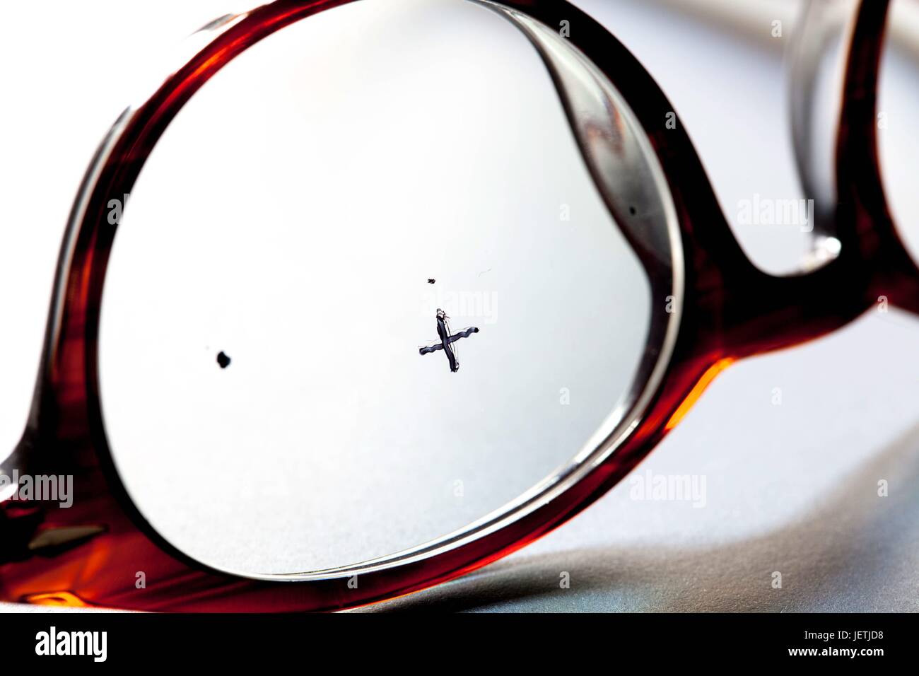 An ophtalmic optician left marks on a pair of varifocals which were ...