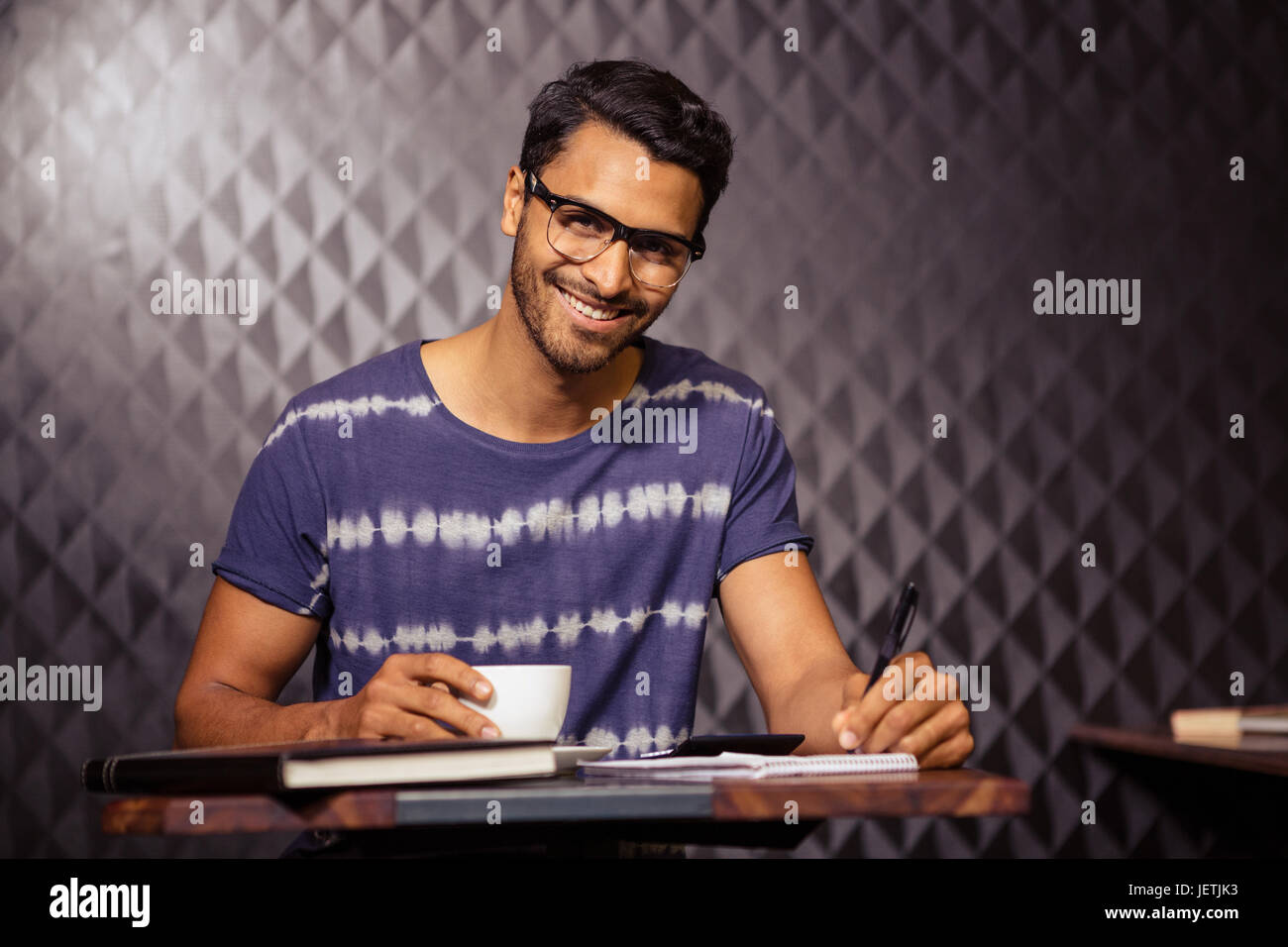 Man taking notes Stock Photo - Alamy