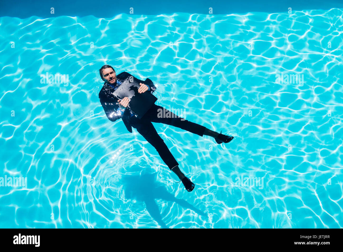 Dressed into pool hi-res stock photography and images - Alamy