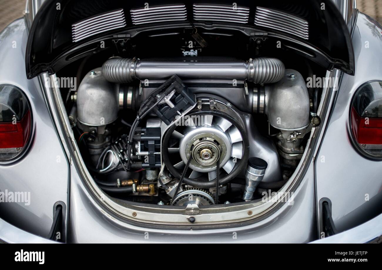 The engine compartment of a VW Beetle is open at the Maikaefertreffen ...