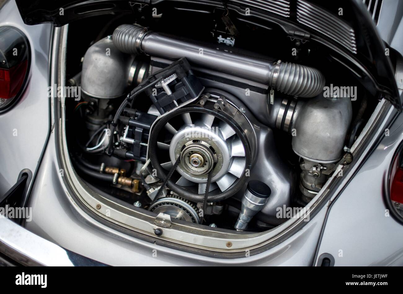 The engine compartment of a VW Beetle is open at the Maikaefertreffen ...