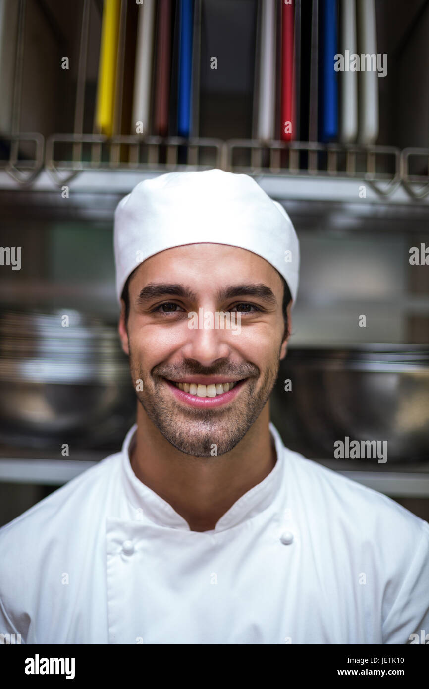 Handsome chef looking at camera Stock Photo - Alamy