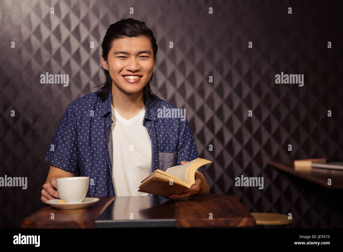 Man reading a book Stock Photo - Alamy
