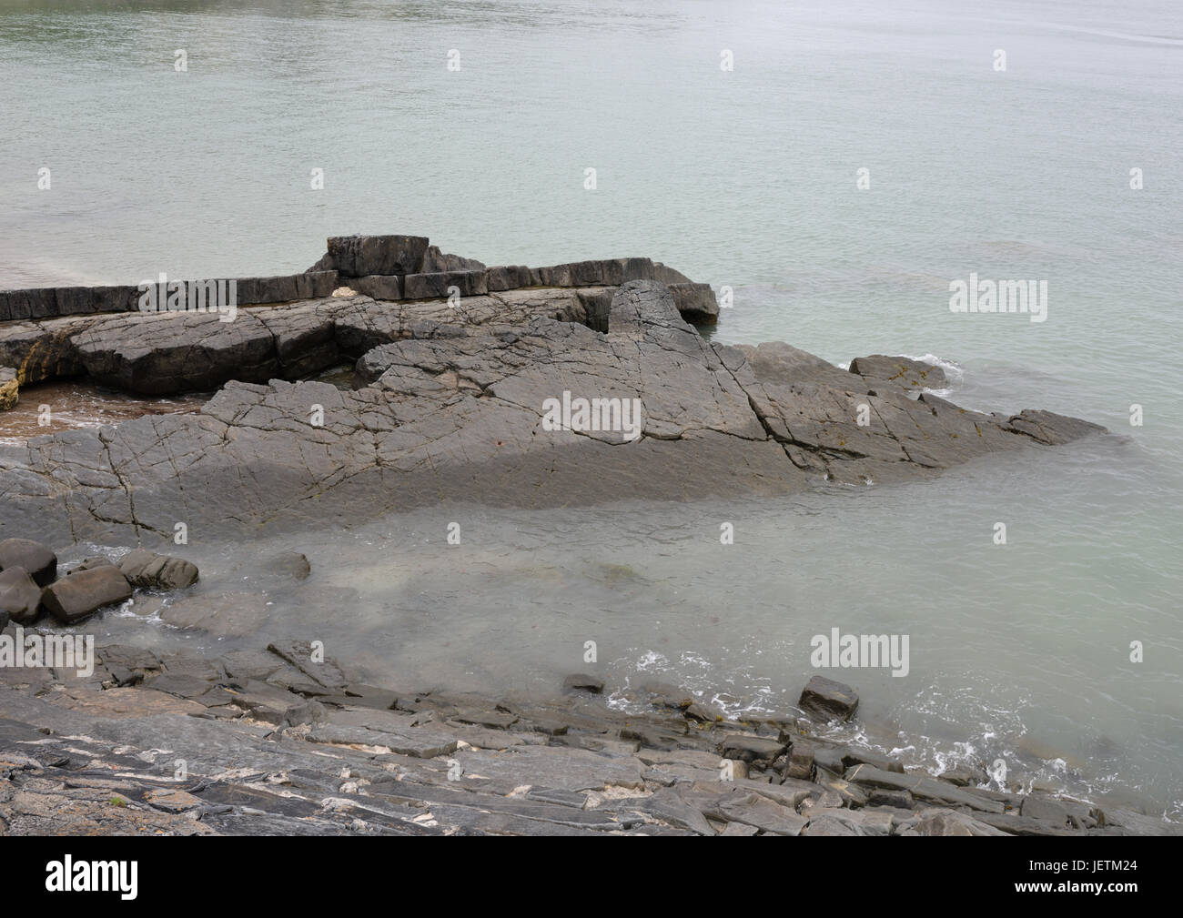 Rock formation at New quay cardigan bay wales Stock Photo - Alamy