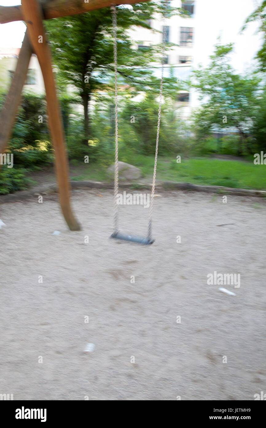 A swinging child swing on a public playground. 5/22/2017 | usage ...