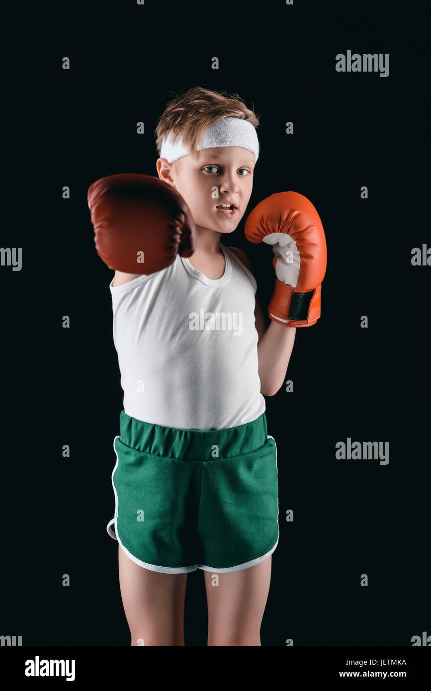 boy in boxing gloves isolated on black, active kids concept Stock Photo ...